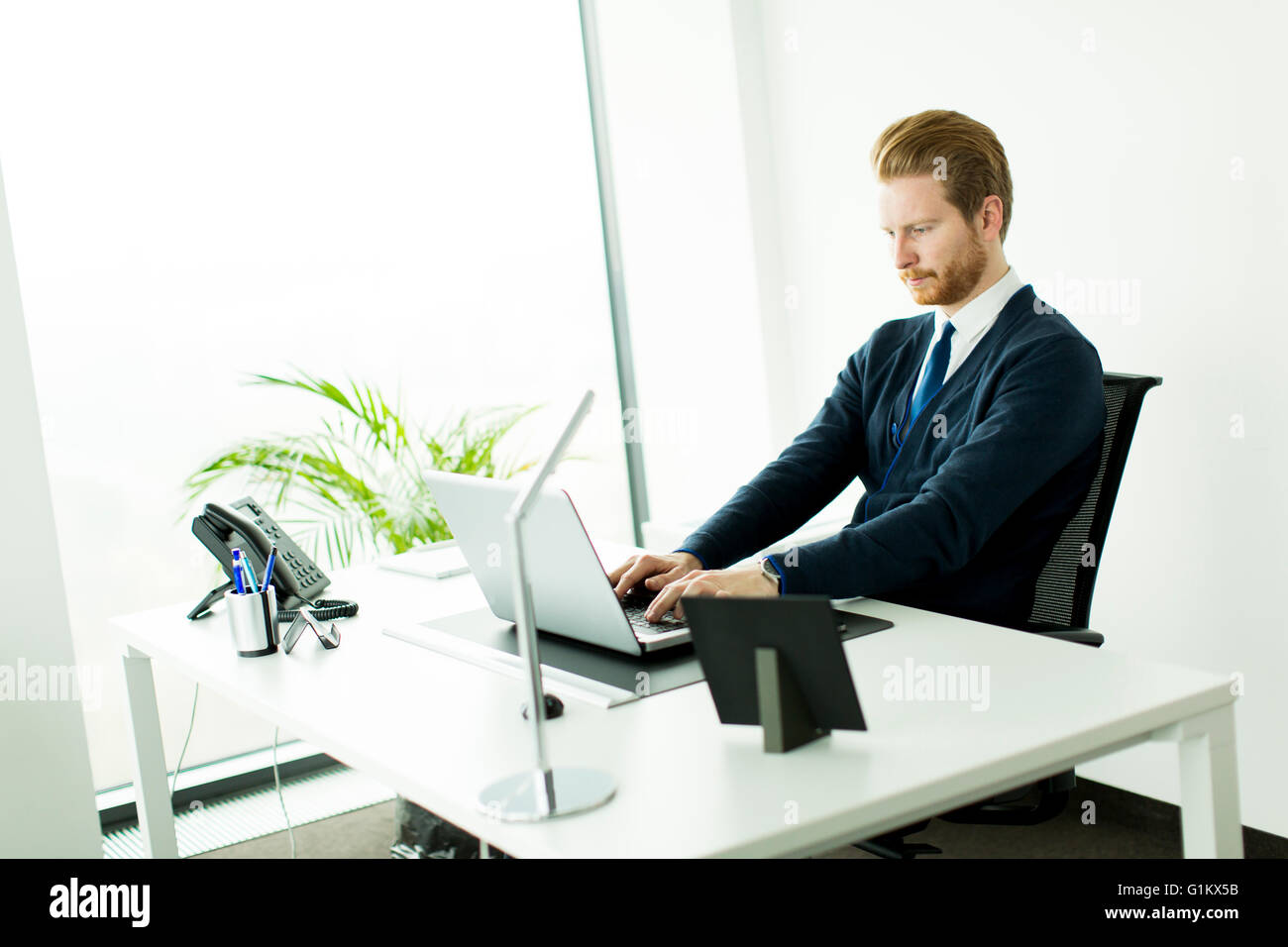 Male worker working desk in hi-res stock photography and images - Alamy