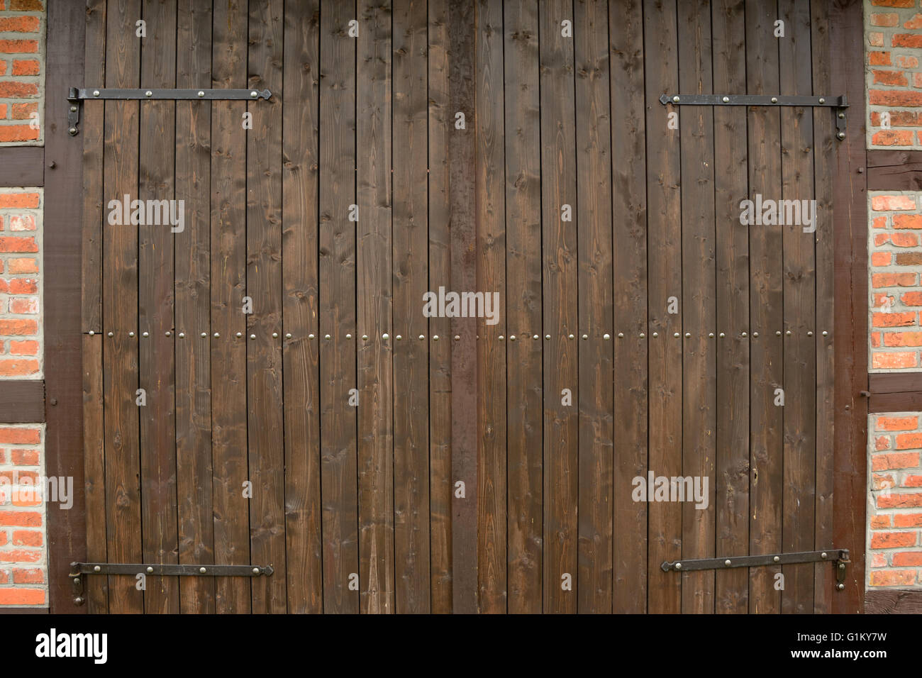 Old vintage brown wooden barn gate Stock Photo - Alamy