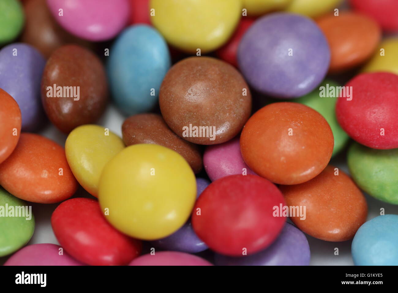 Close-up macro shot of colourful sugar coated chocolate candy sweets ...