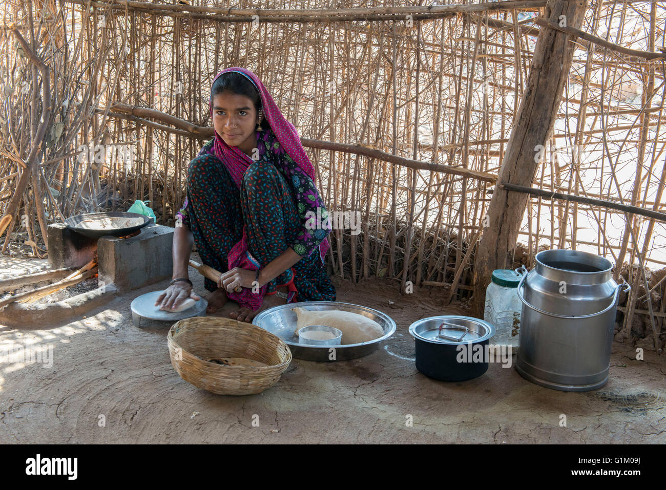 Female Rabari Villager Baking Bread Stock Photo - Alamy