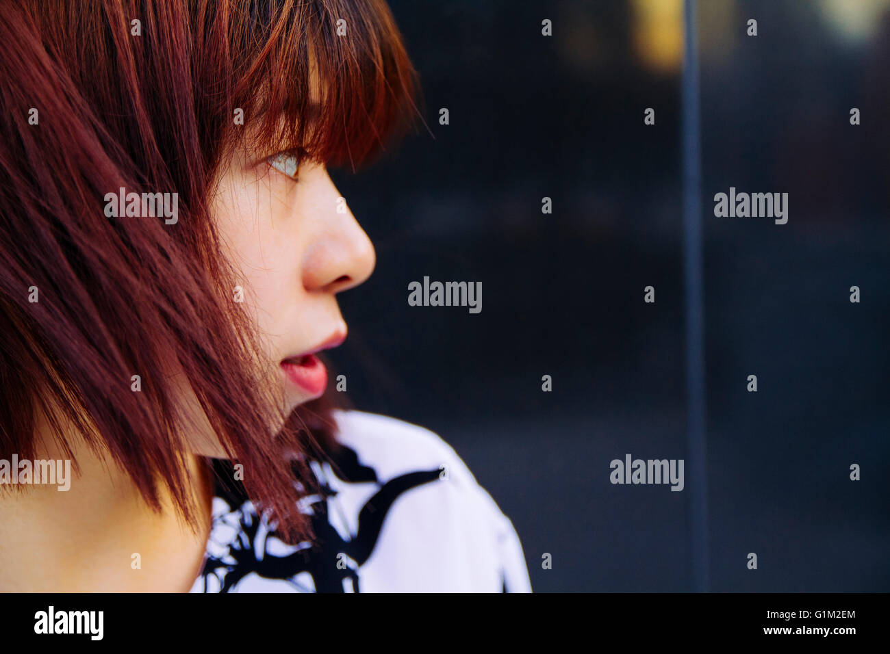 Close up of profile of Chinese woman Stock Photo - Alamy