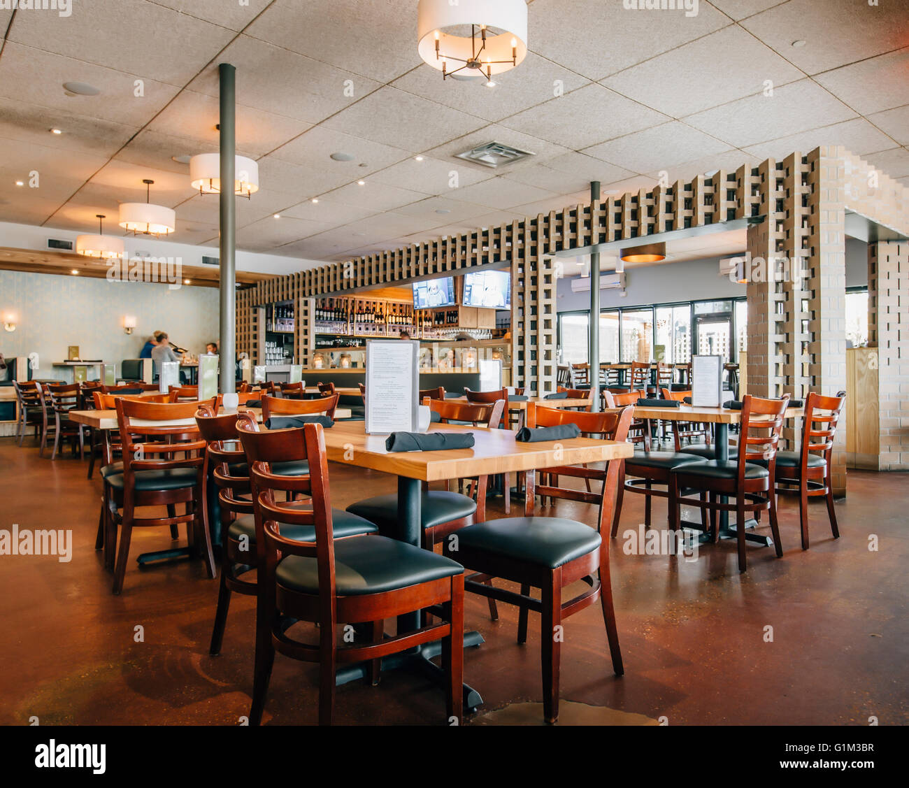 Empty tables and chairs in restaurant Stock Photo - Alamy