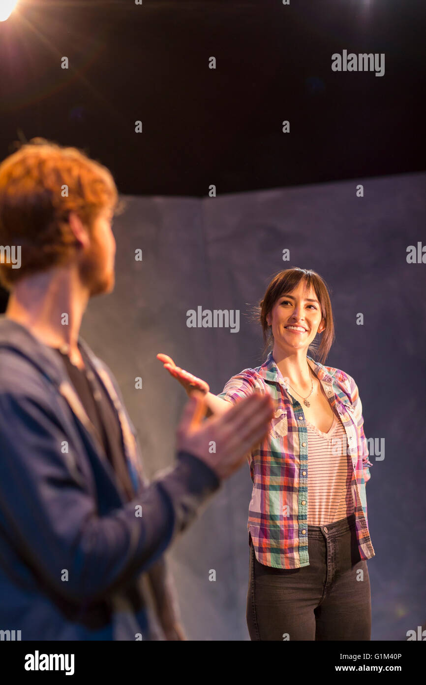 Actors rehearsing on theater stage Stock Photo - Alamy