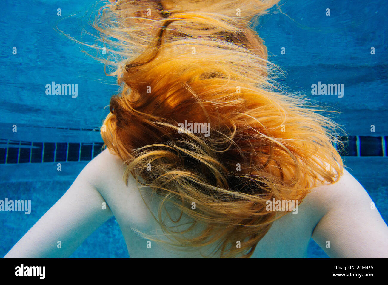 Caucasian woman underwater in swimming pool Stock Photo - Alamy