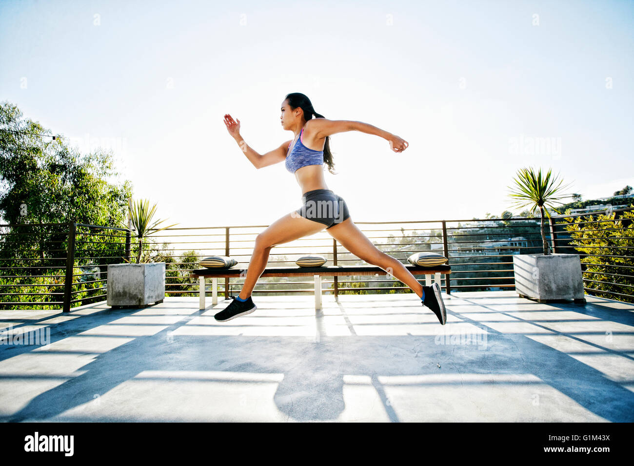 Chinese athlete running on balcony Stock Photo - Alamy