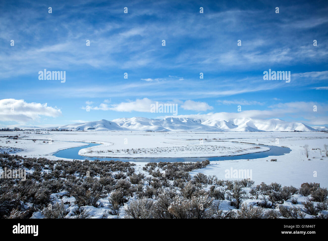 River in snowy remote landscape Stock Photo - Alamy