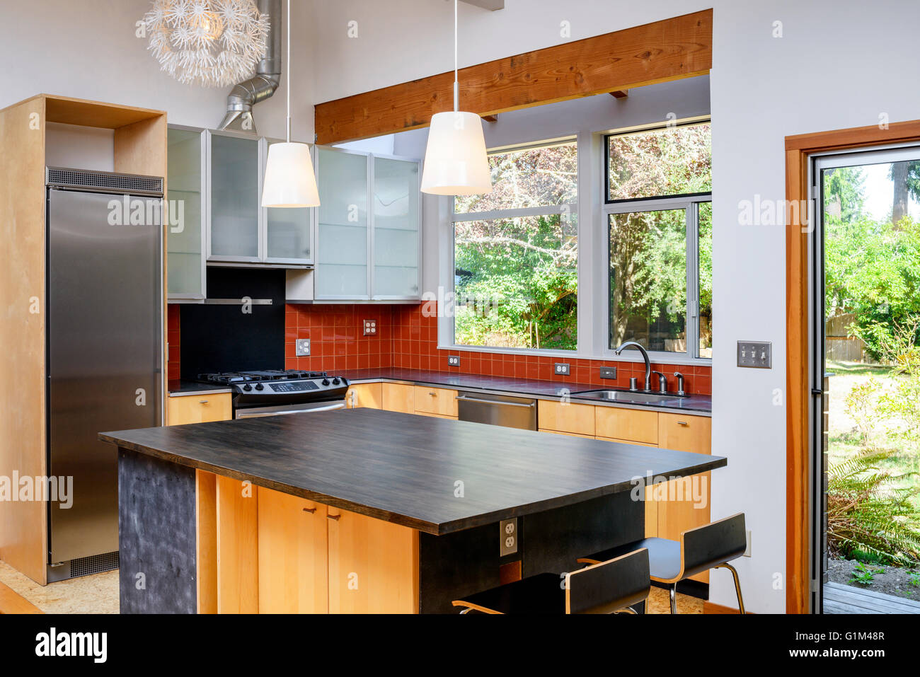 Countertop and lights in modern kitchen Stock Photo - Alamy