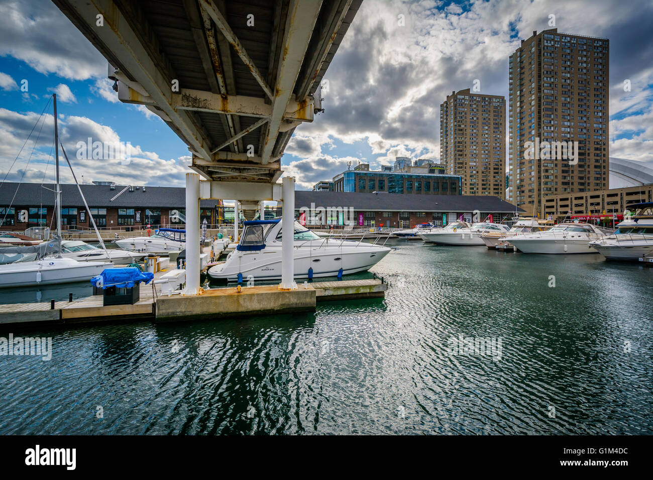 Bridge over a marina and buildings at the Harbourfront, in Toronto ...