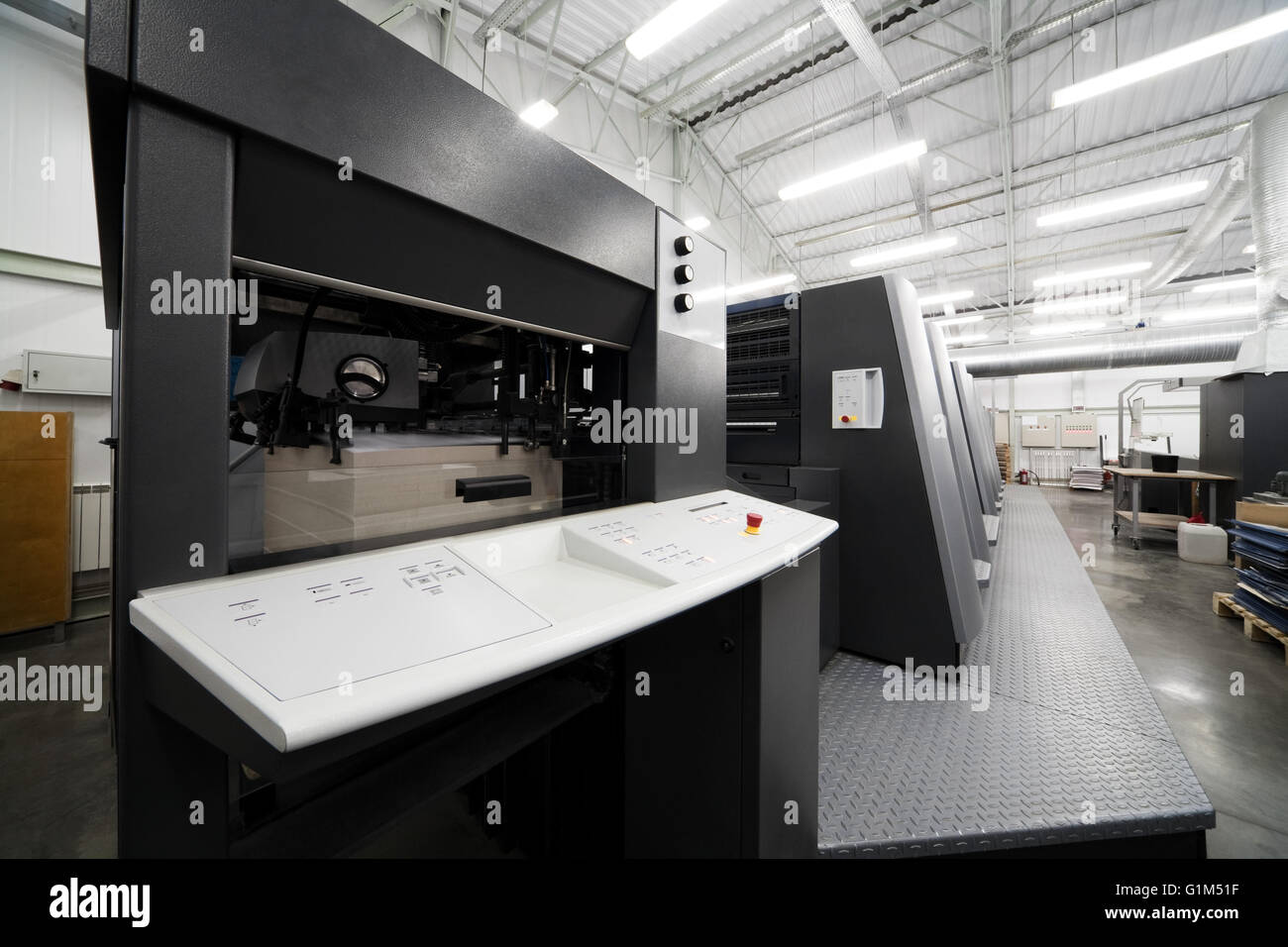 The equipment for printing in a modern printing house Stock Photo - Alamy