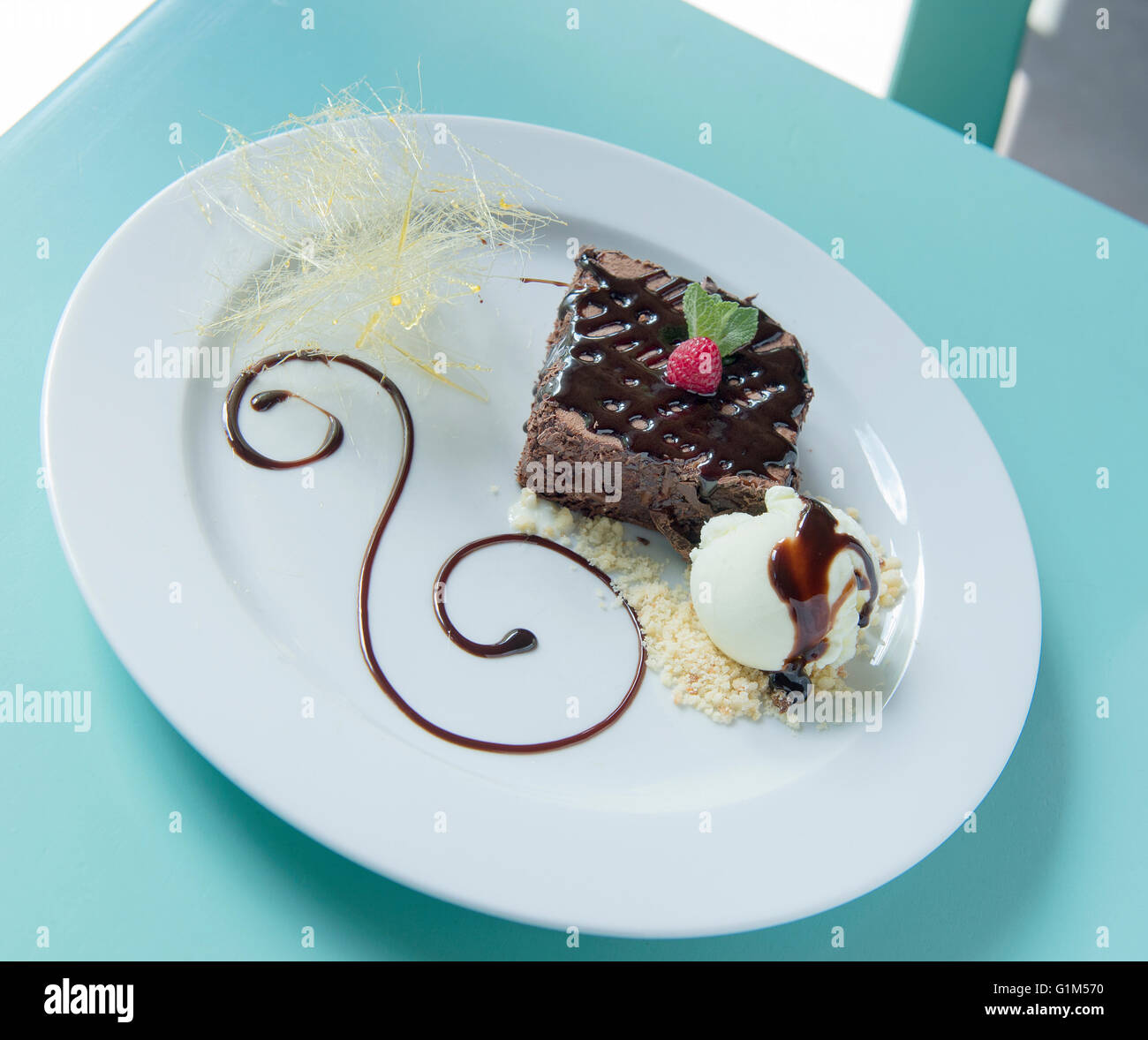 tasty double chocolate brownie with ice-cream plating Stock Photo - Alamy