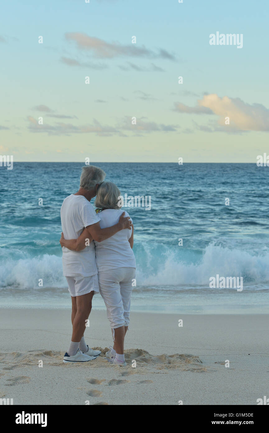 elderly couple rest at tropical resort Stock Photo - Alamy