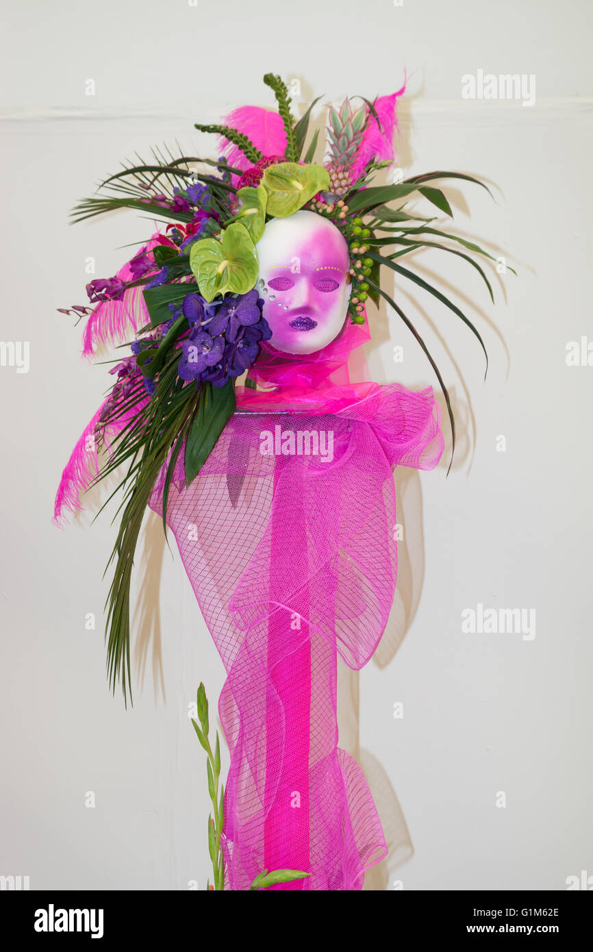 Flower arrangement with venetian mask Stock Photo - Alamy