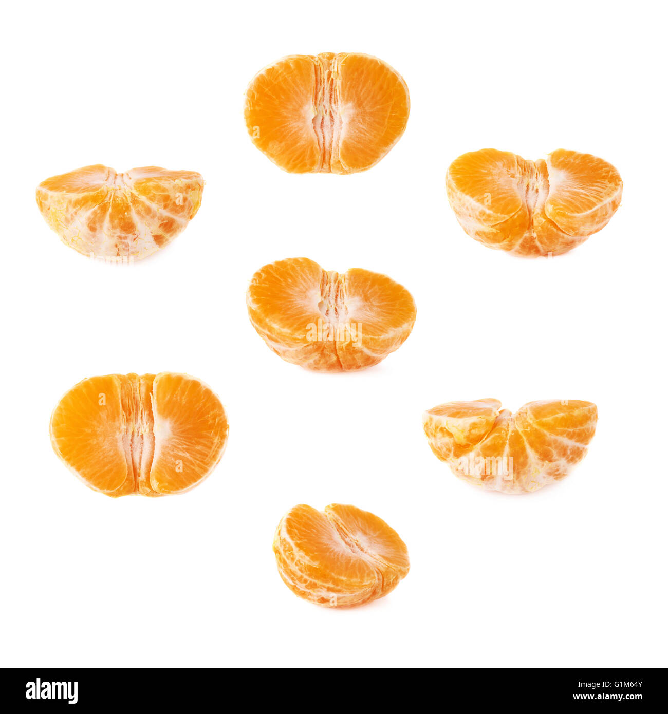 Half of fresh juicy tangerine fruit isolated over the white background ...