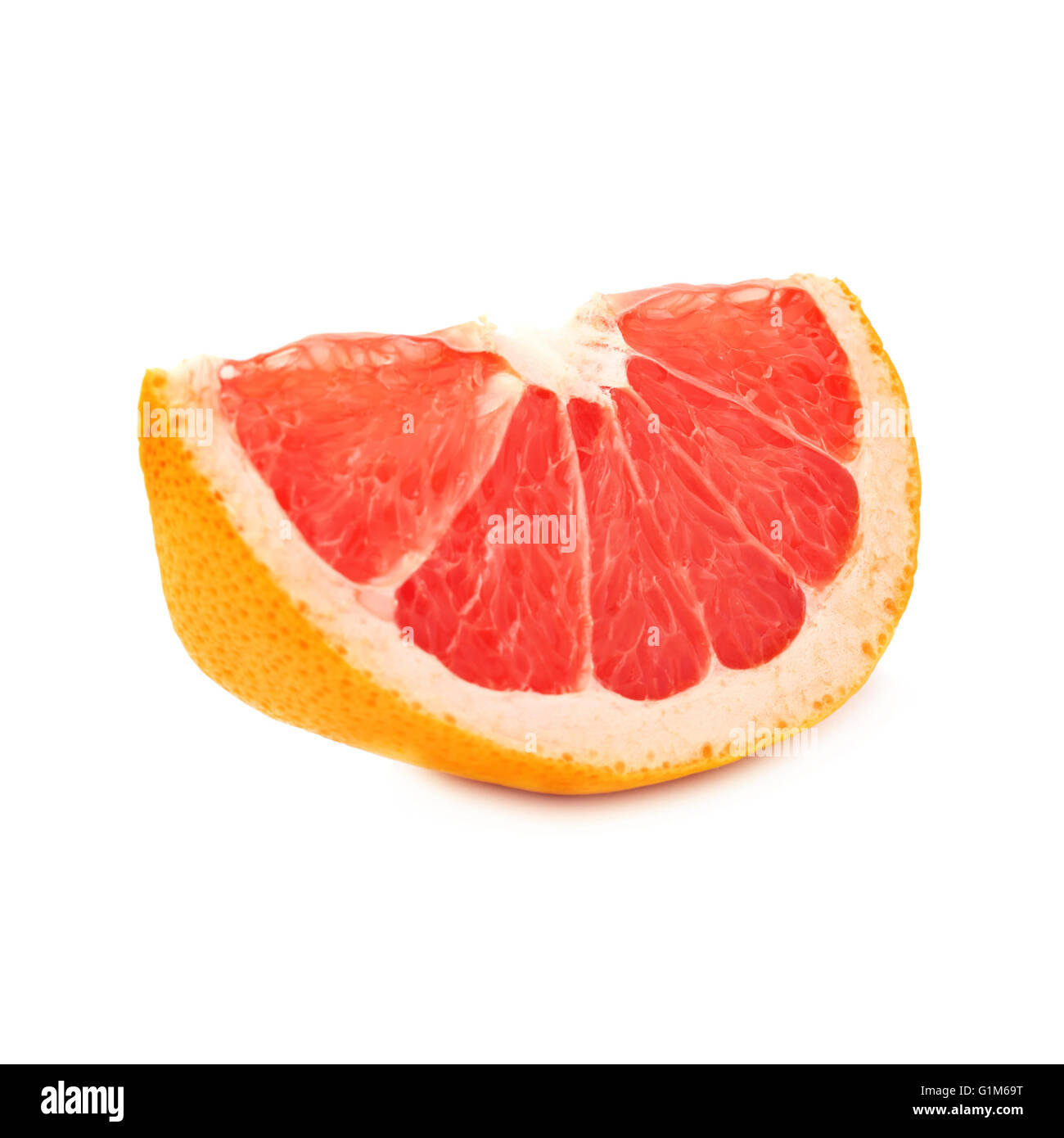Dried small slice section of grapefruit isolated over the white ...