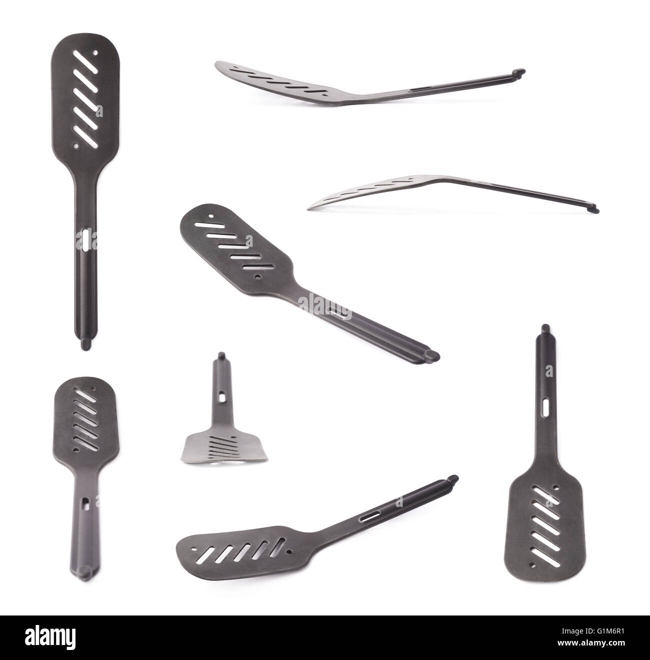 Used black plastic spatula isolated Stock Photo - Alamy