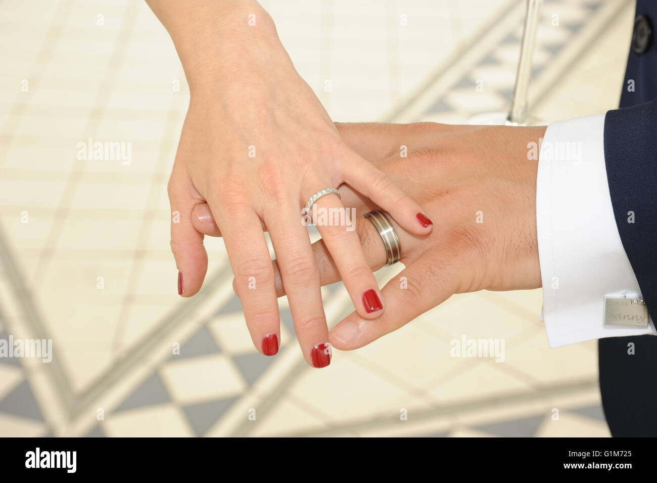 Wedding rings hands hi-res stock photography and images - Alamy