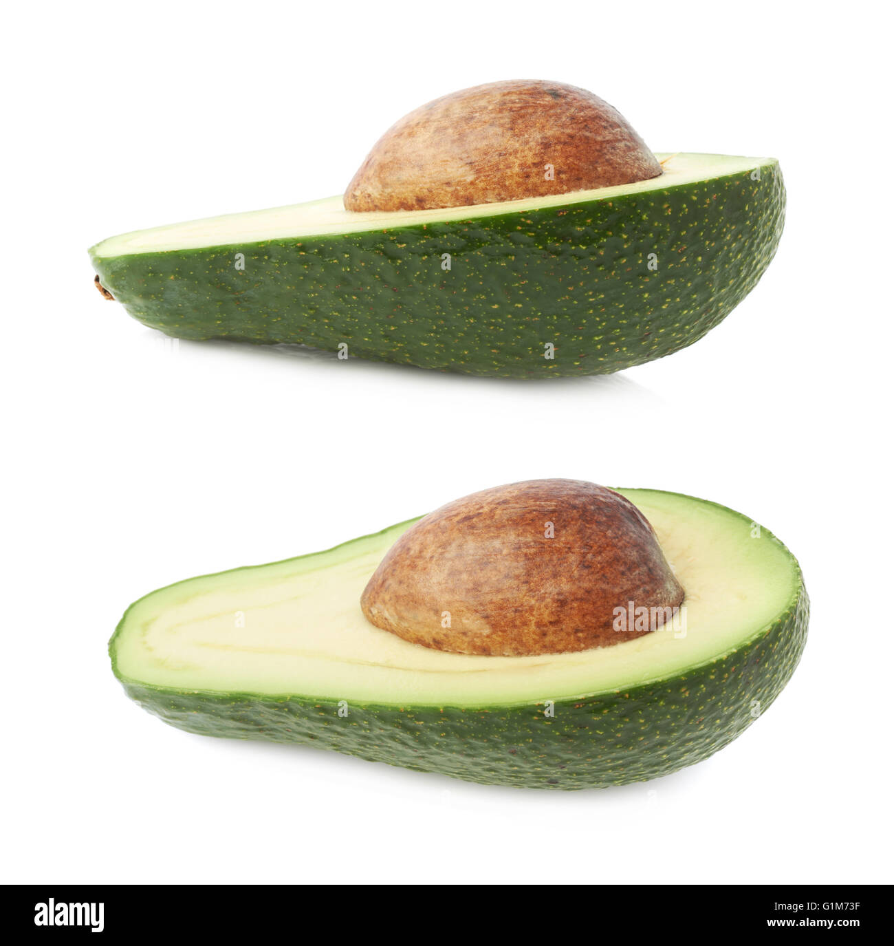 Cut in half open avocado fruit Stock Photo - Alamy