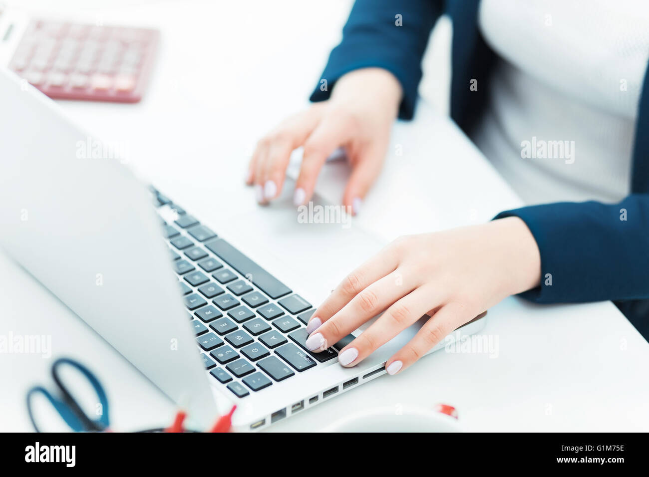 The female hands on the keyboard of her laptop computer Stock Photo - Alamy