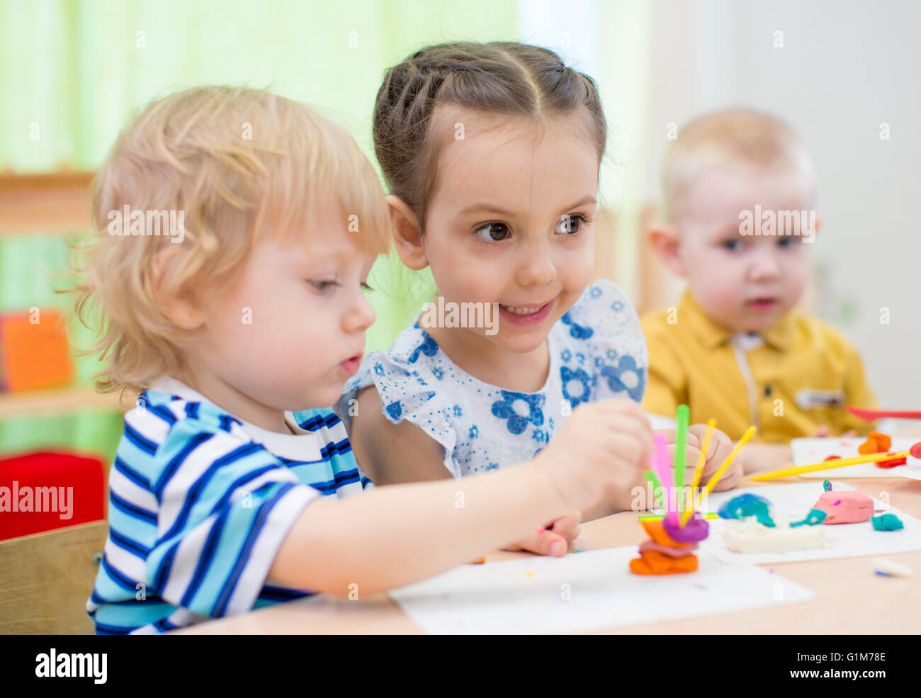 kids group doing arts and crafts in kindergarten Stock Photo - Alamy