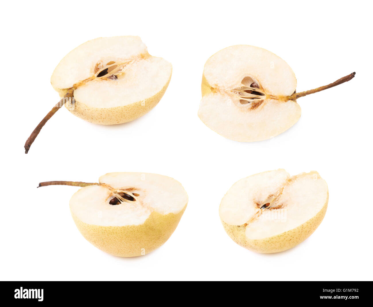 Yellow pear cut in half isolated Stock Photo - Alamy