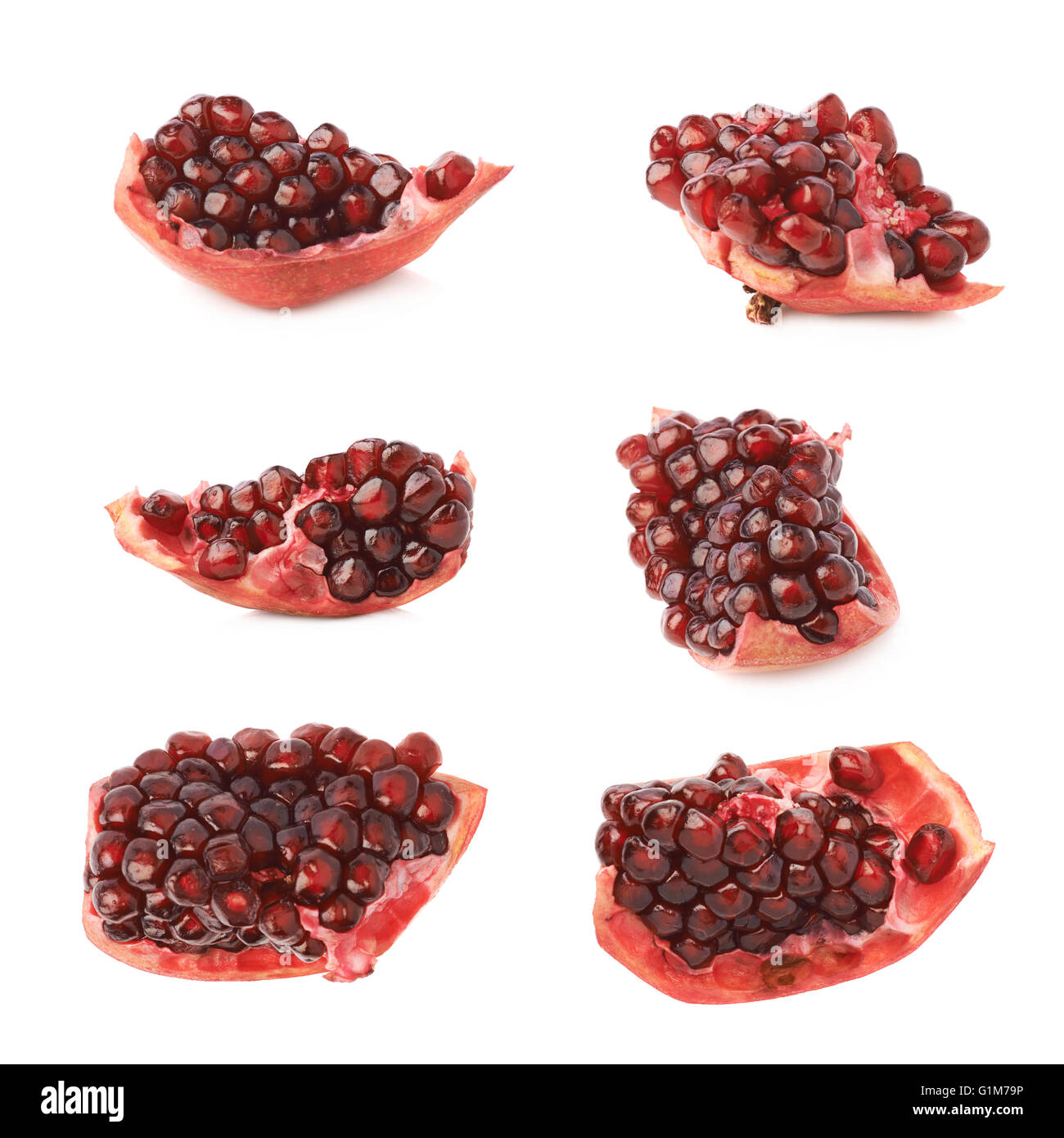 Pomegranate fruit's fragment isolated Stock Photo - Alamy