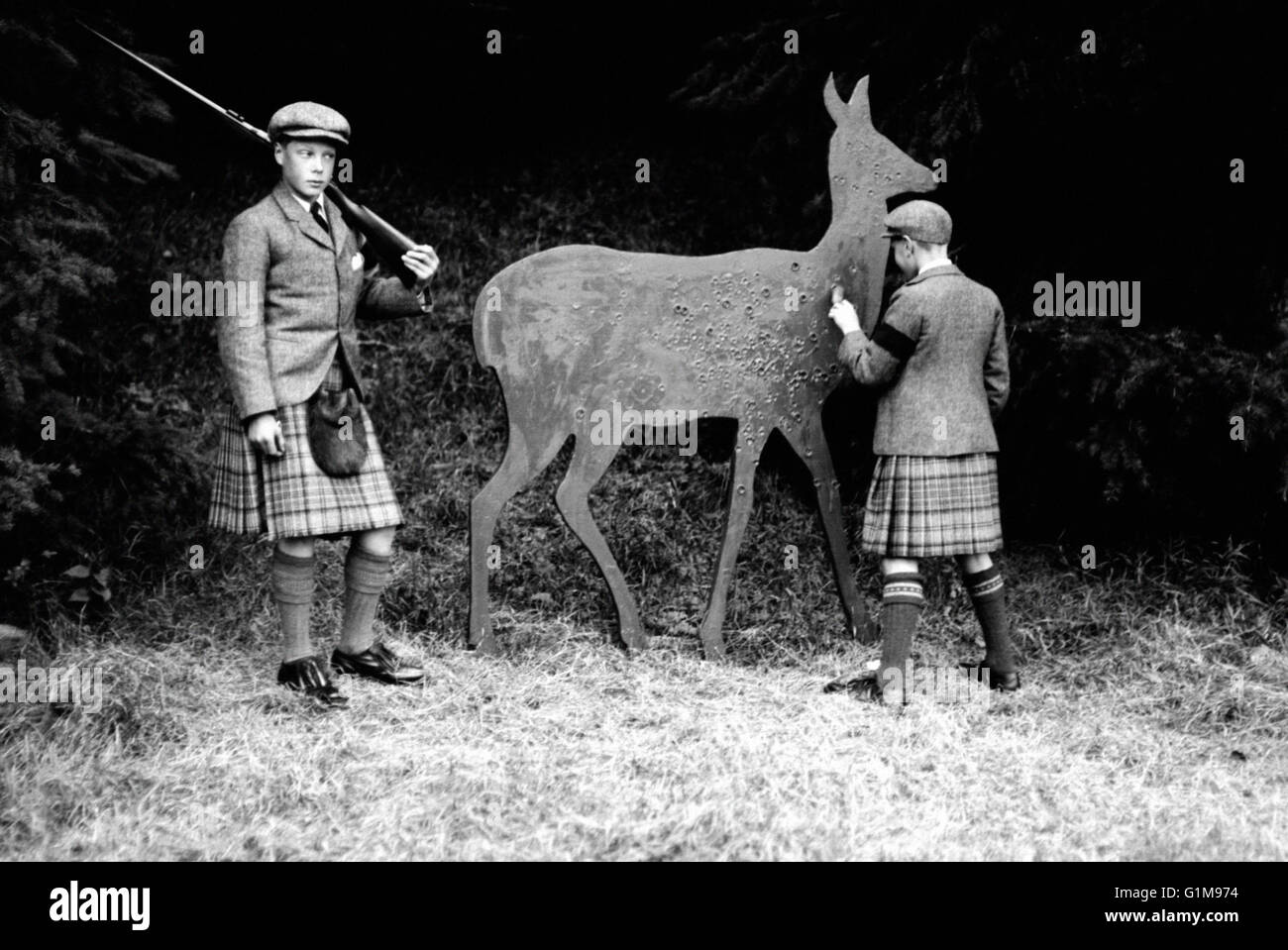 Both wearing kilts Black and White Stock Photos & Images - Alamy