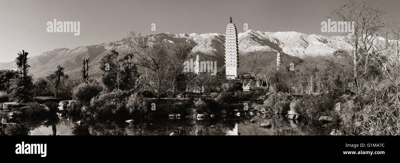Ancient pagoda in Dali old town with snow capped Mt Cangshan, Yunnan ...