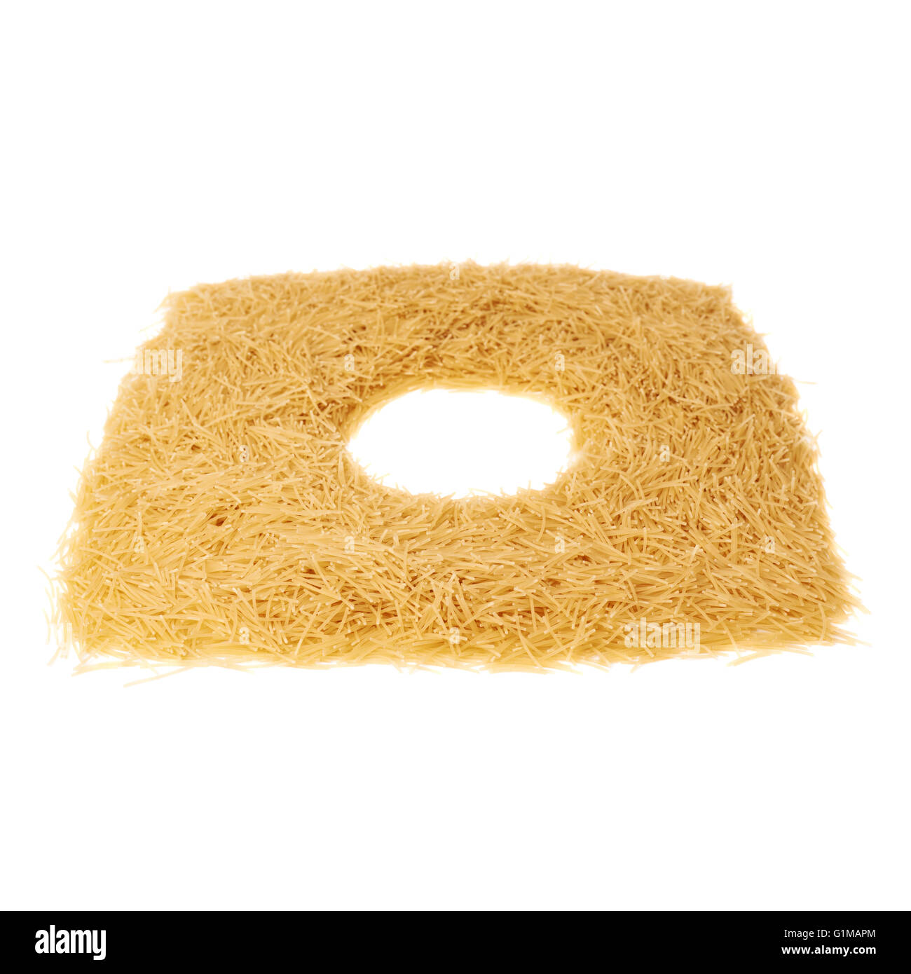 Round frame made of dry noodles pasta over isolated white background ...