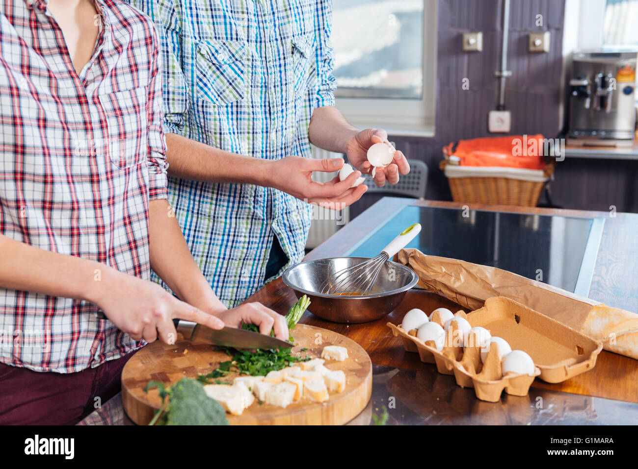 Kitchen woman cooking standing hi-res stock photography and images - Alamy