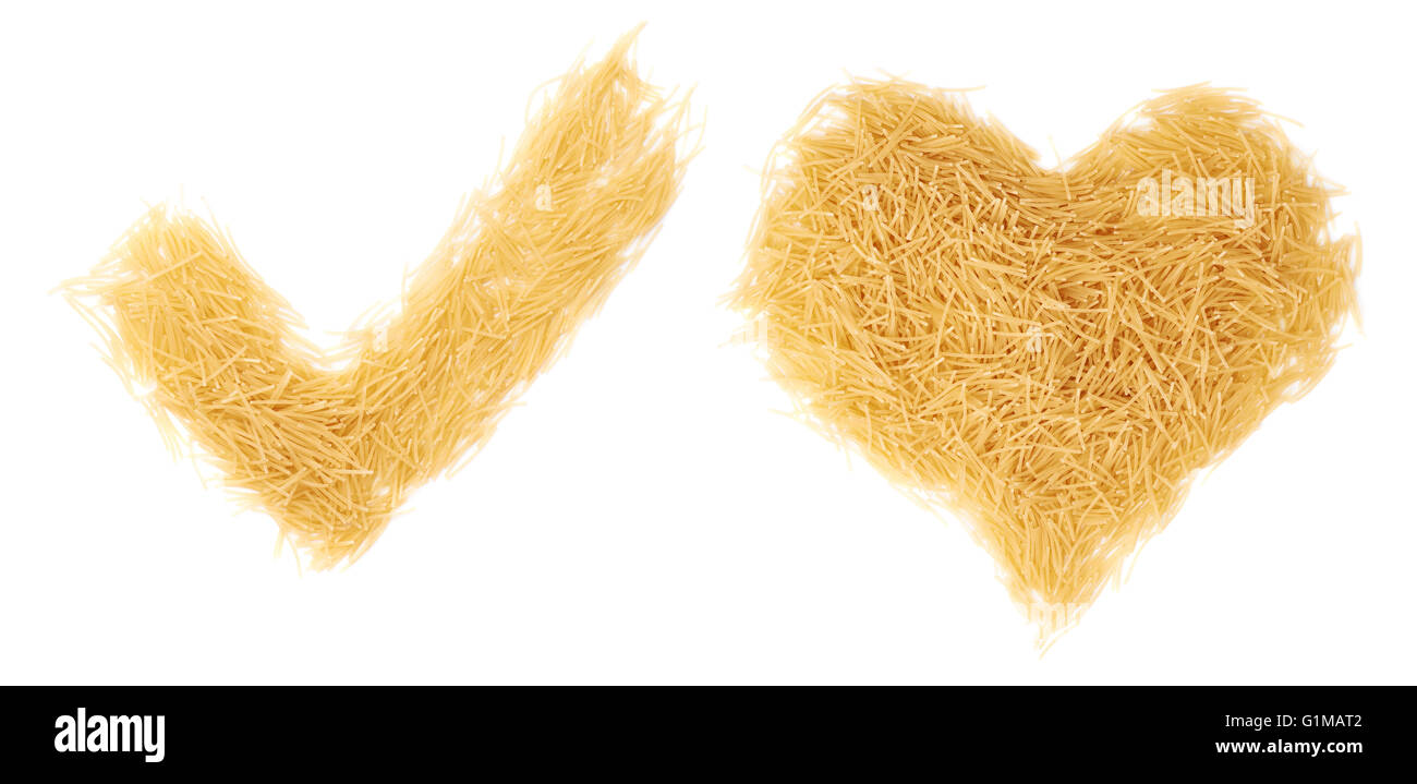 Yes tick sign symbol mark and heart shape made of dry noodles pasta ...