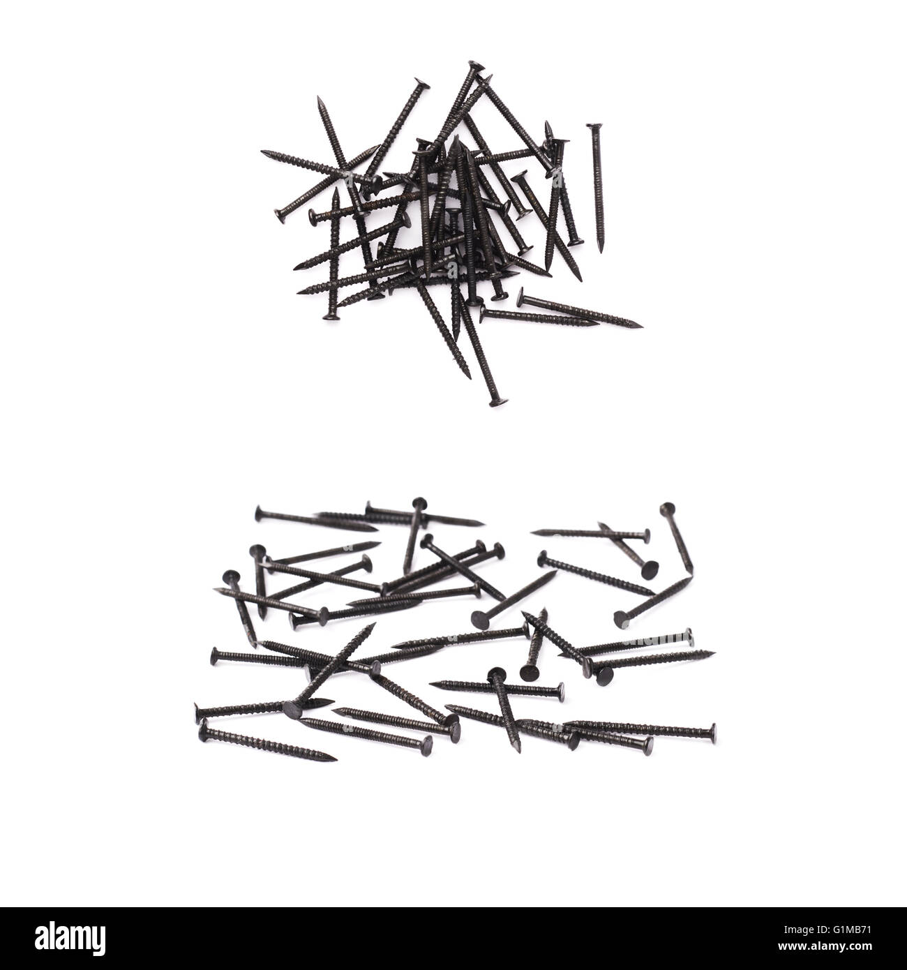 Set of pile of nails isolated over white background Stock Photo - Alamy