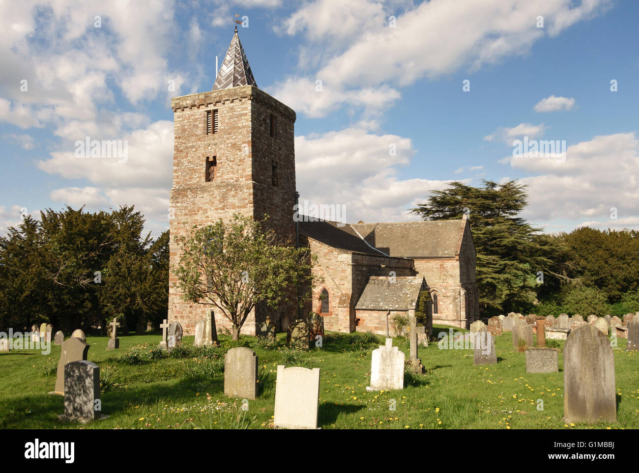 Morland, Cumbria, UK. The medieval St Laurence's Church with its 11c ...