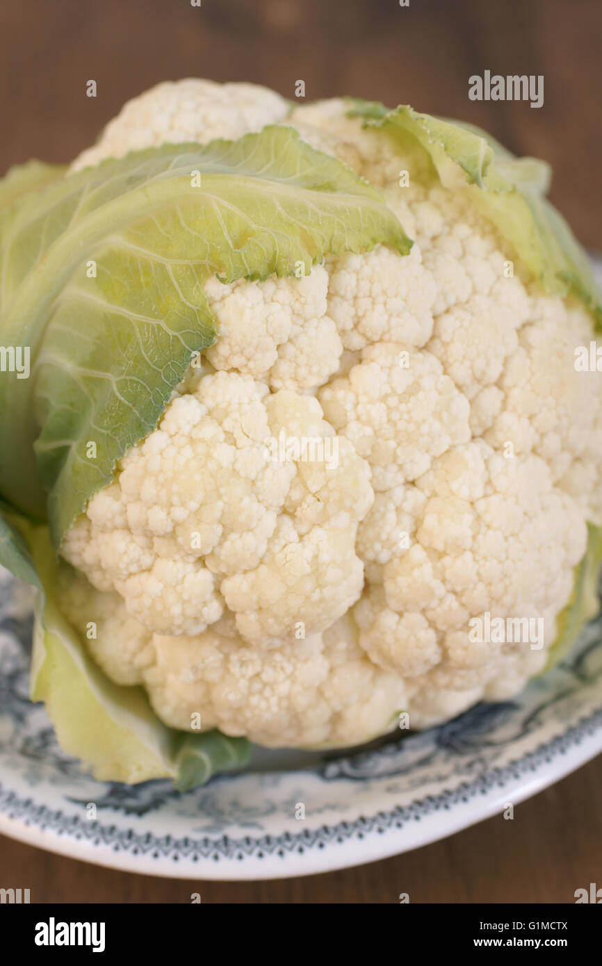 Nice fresh natural cauliflower head with leaves useful for healthy and ...