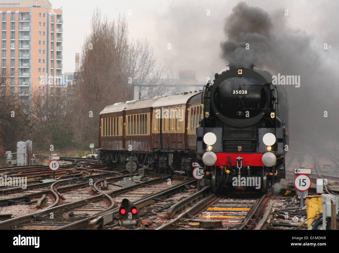 35028 Clan Line at Clapham Junction with the VSOE Pullmans from London ...
