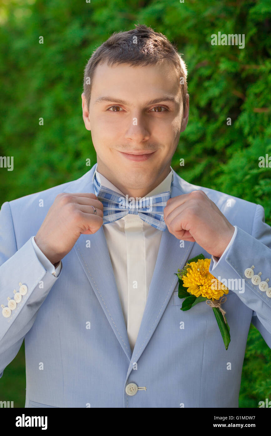 Blue green suit hi-res stock photography and images - Alamy