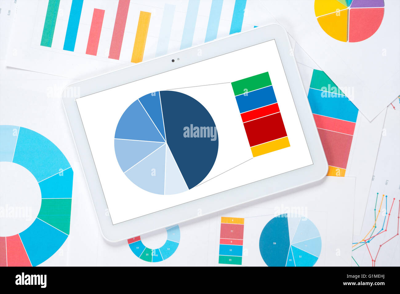 tablet detailed pie chart with colorful background Stock Photo - Alamy