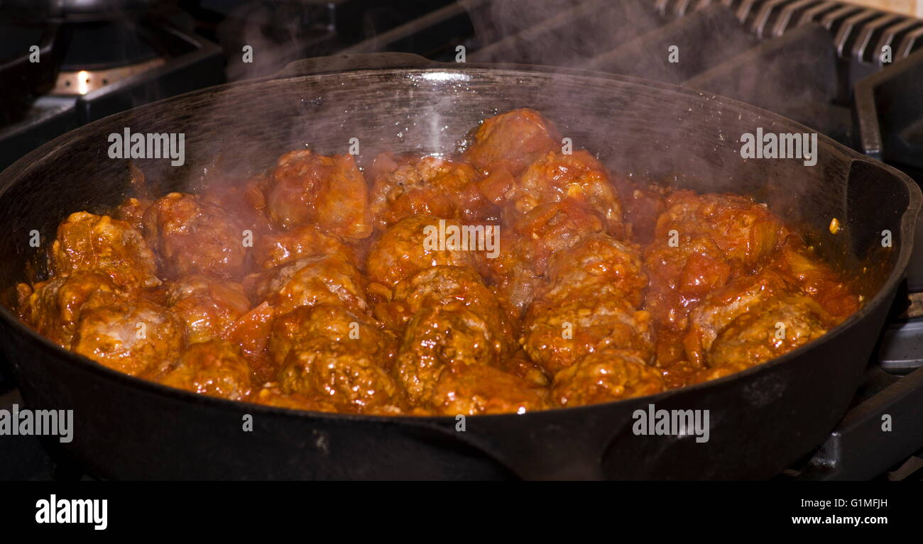 Meat balls cooking Stock Photo - Alamy