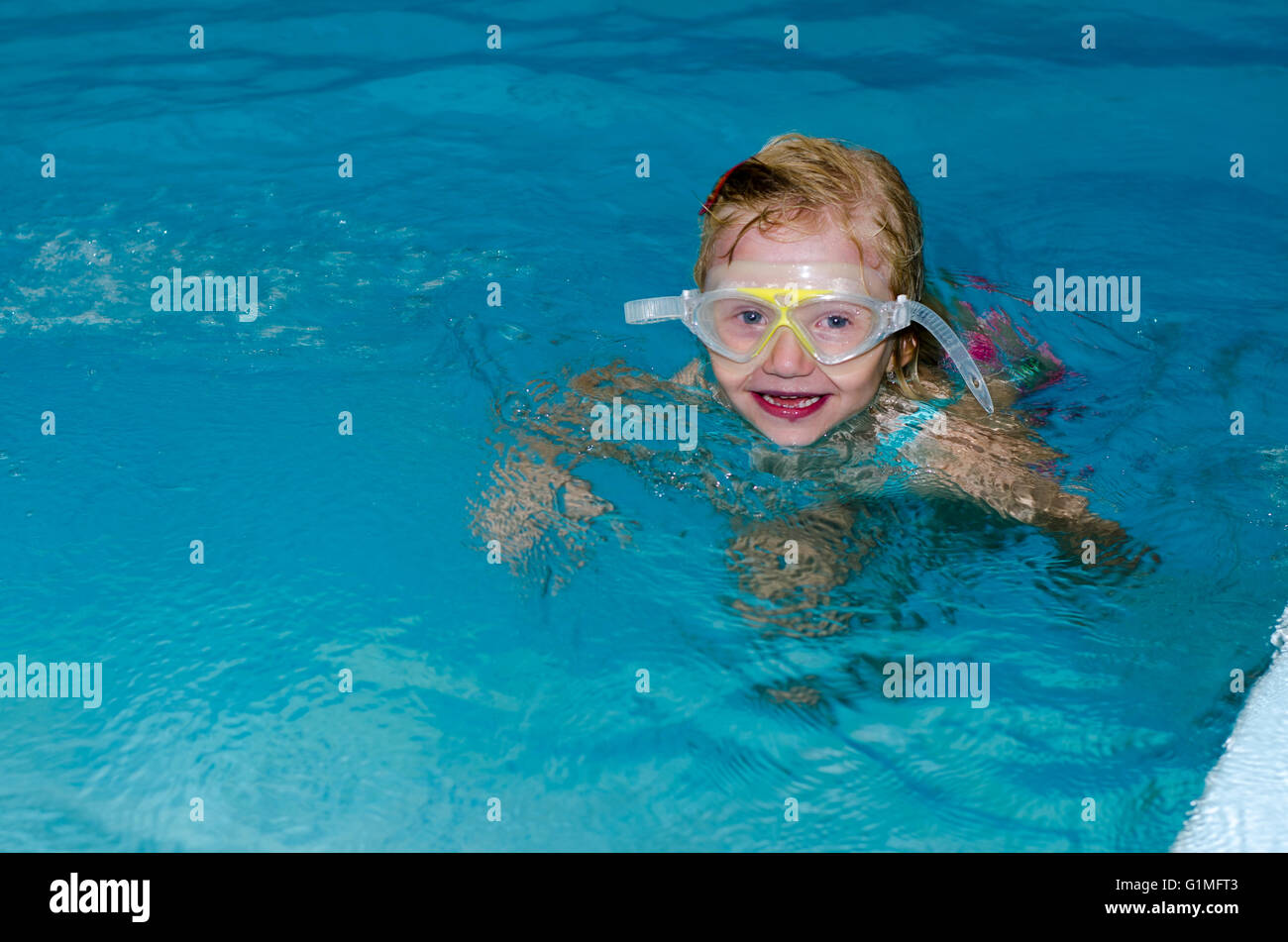 One kid swimming hi-res stock photography and images - Alamy
