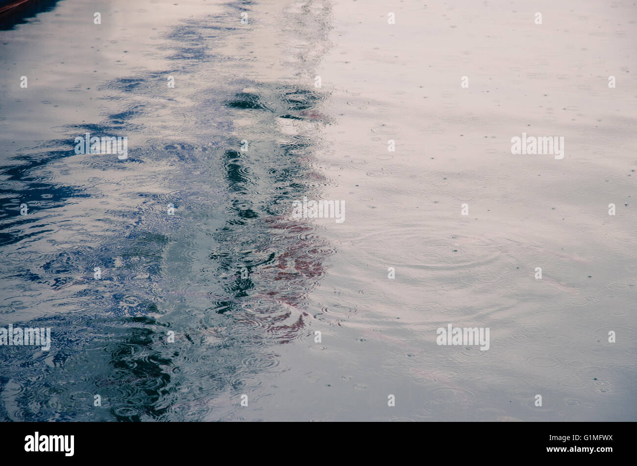 raindrops in sea water surface Stock Photo - Alamy
