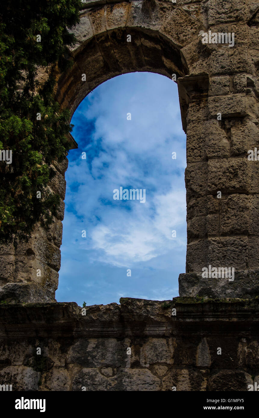 view to the sky through stone window Stock Photo - Alamy