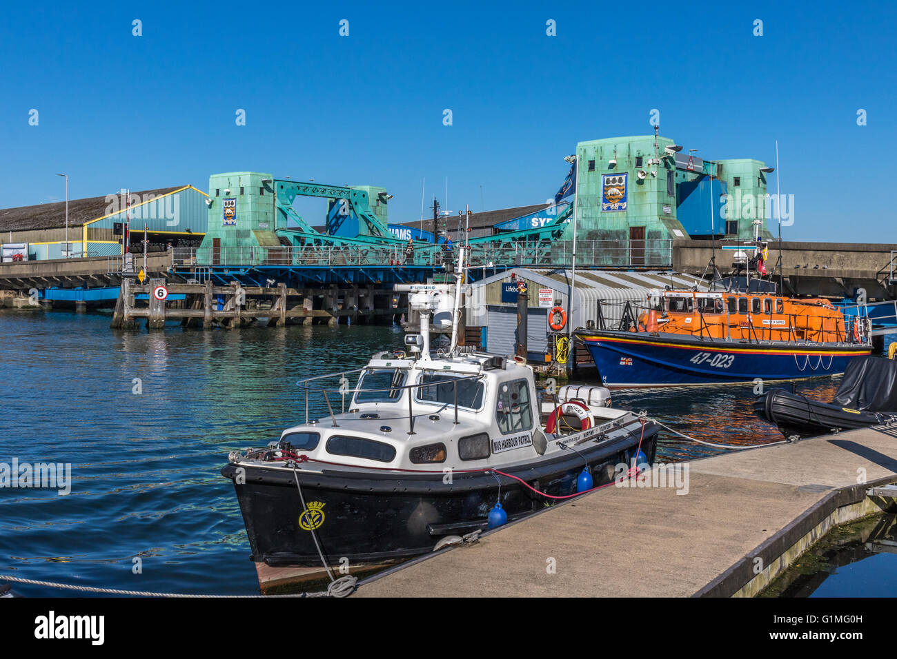 England Dorset Poole Boats at Poole quay showing the old lift bridge ...