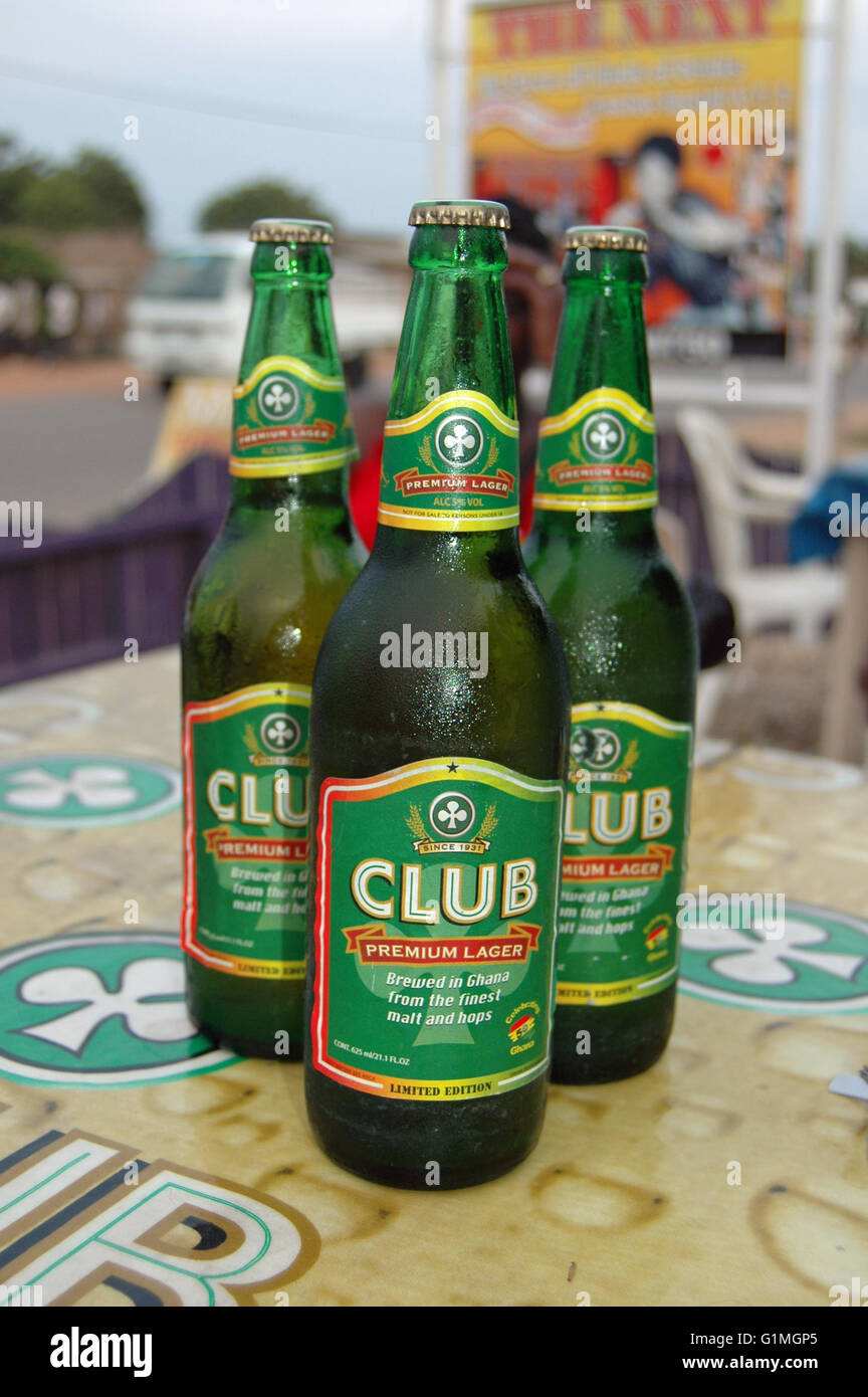 3 green Club Beer bottles, on a table. Ghana, West Africa Stock Photo ...