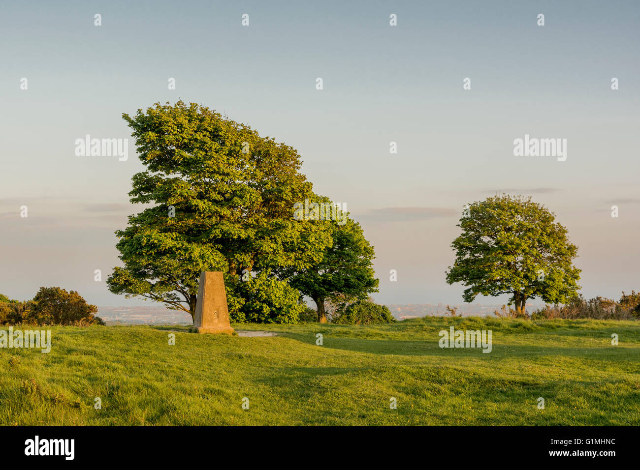 Trig point (triangulation pillar) on the ancient Iron Age Hill Fort of ...