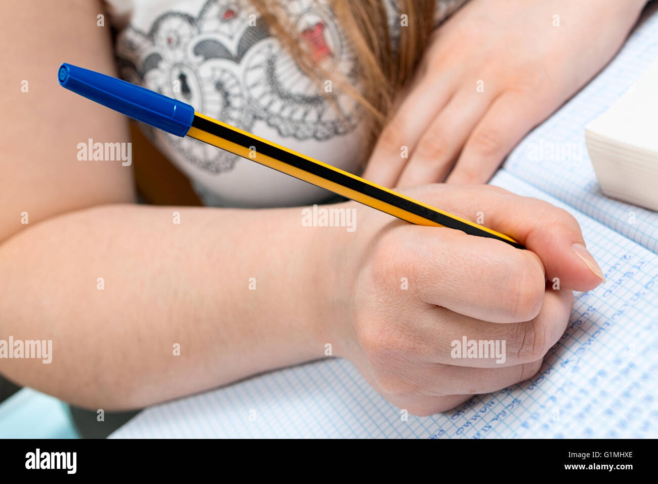 Hands writing exam paper hi-res stock photography and images - Alamy