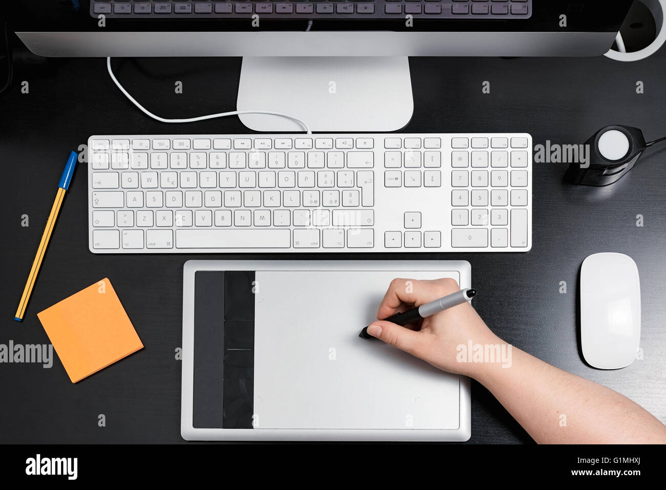flat lay of computer and graphics tablet Stock Photo - Alamy