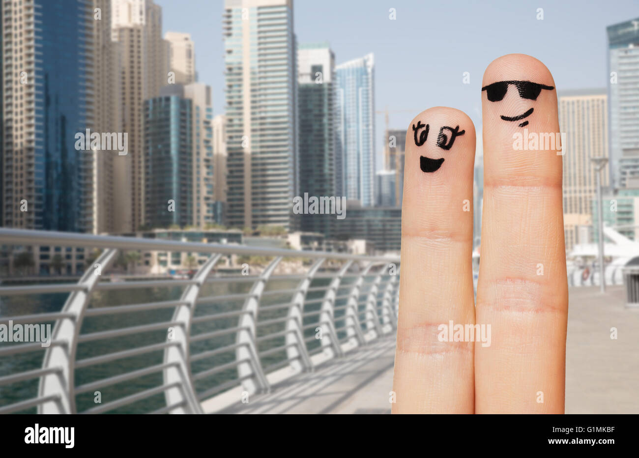 close up of two fingers with smiley faces Stock Photo - Alamy