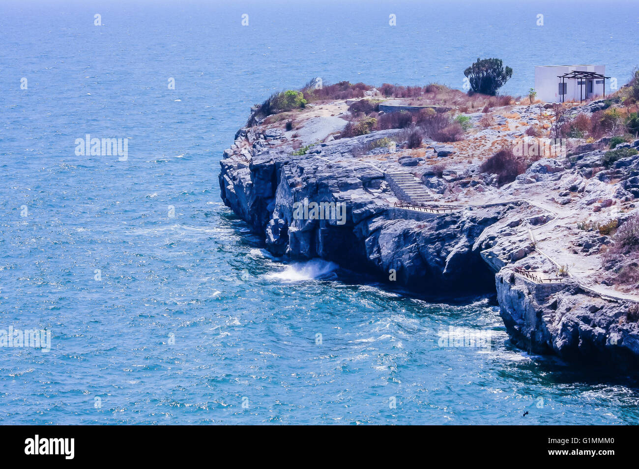 Cliffs And A Gentle Wave Stock Photo - Alamy