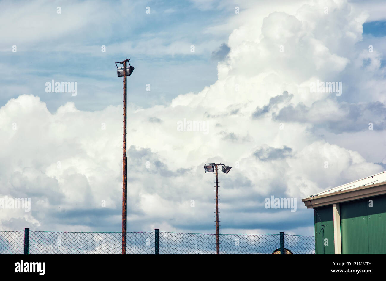 High street lighting and dramatic cloudy sky. Urban scene. Weather ...