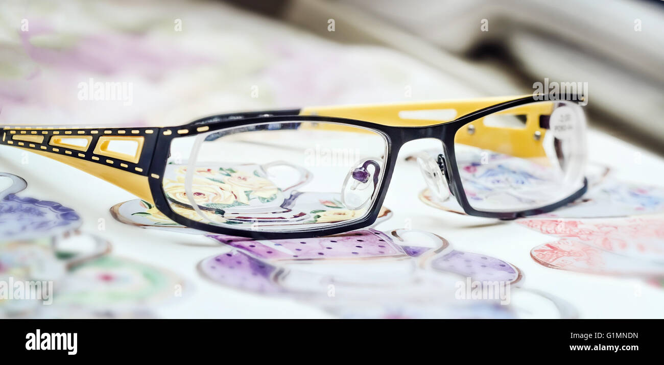 Nice glasses black and yellow frame for person Stock Photo - Alamy