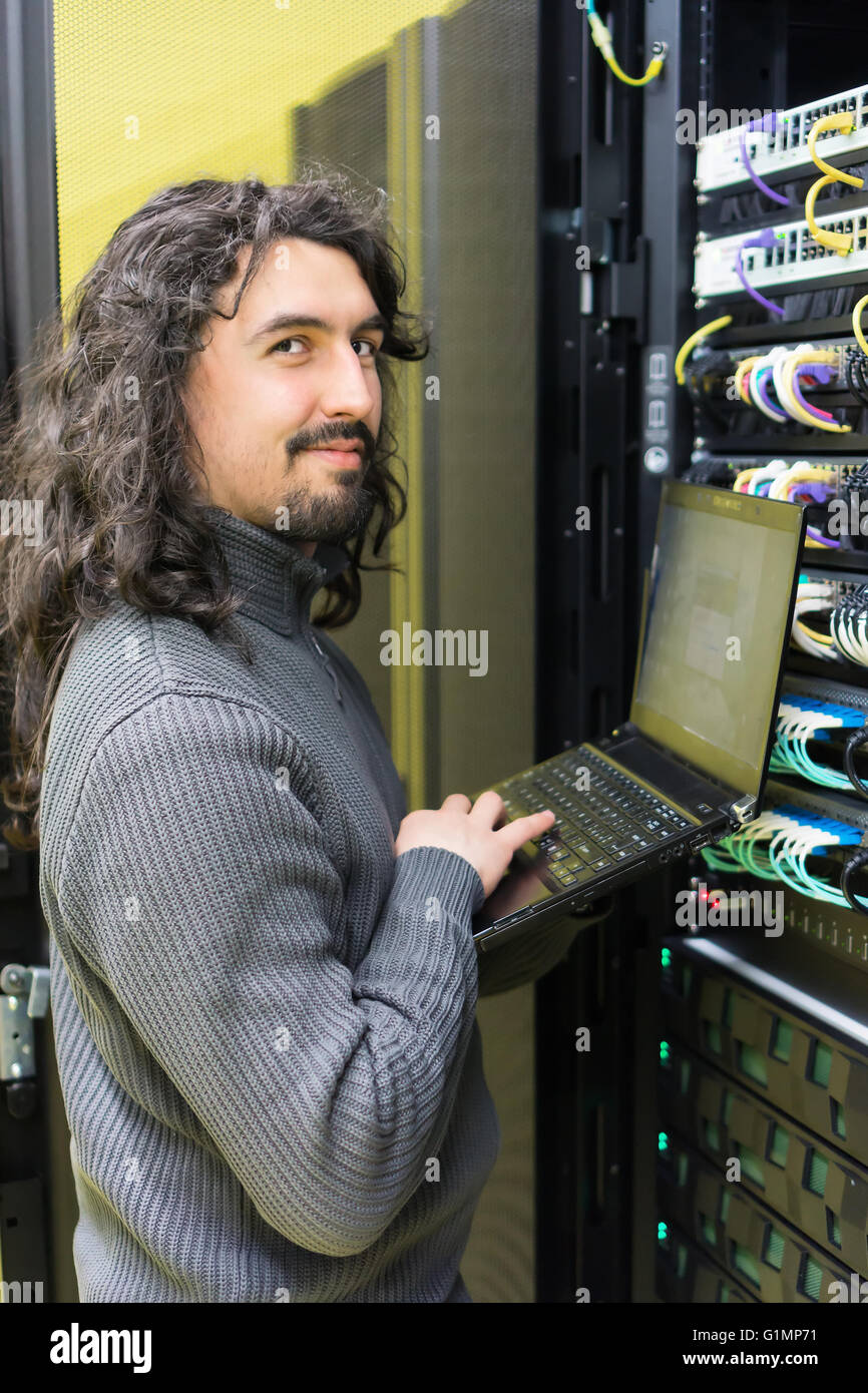 Technician install network rack in hi-res stock photography and images ...